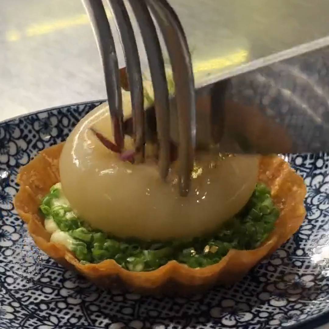 Wonton tartelette, chicken stock sphere, habanero cream cheese, pickle gari